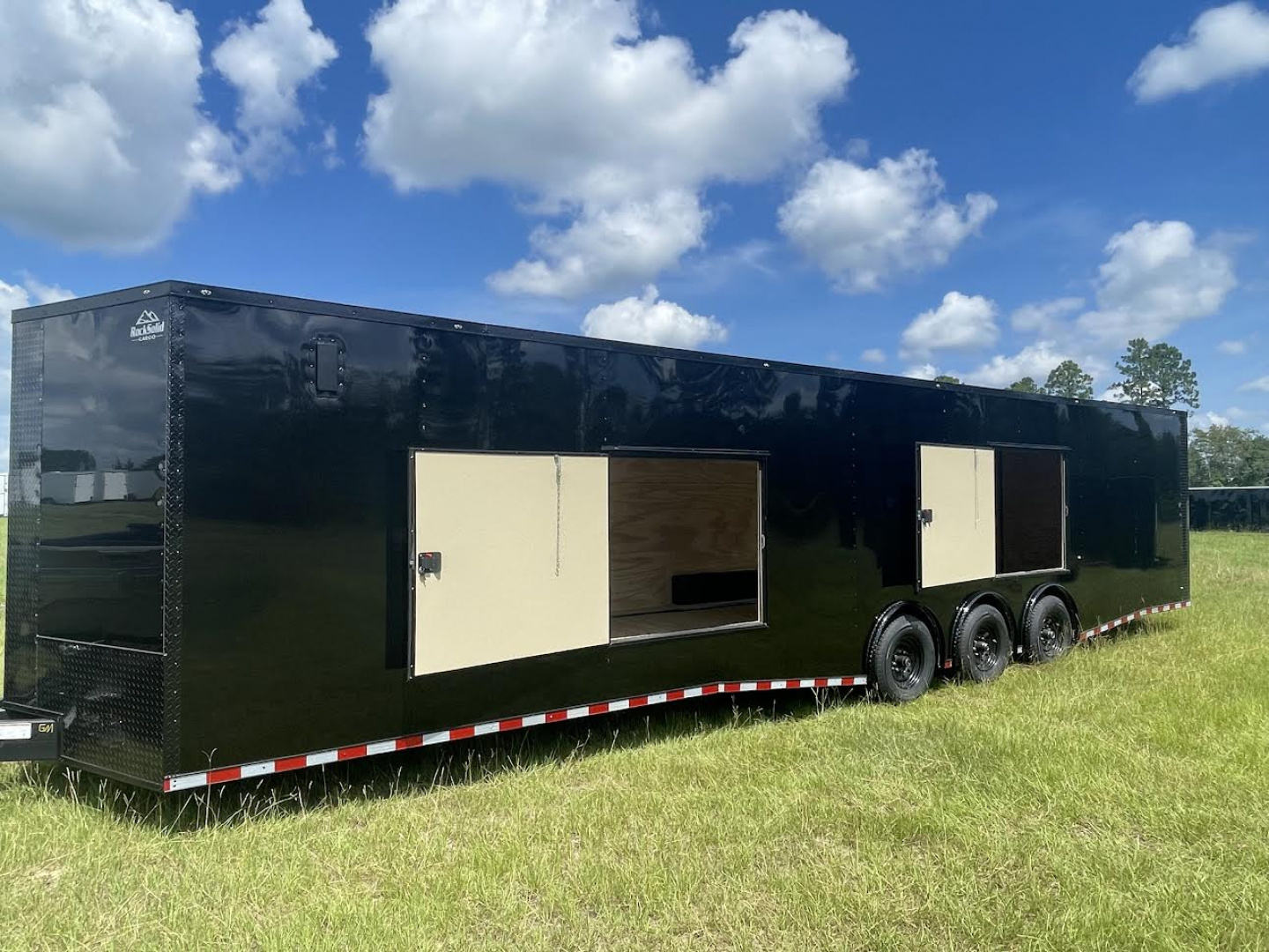 New 8.5x36 Polycore Blackout Enclosed Two Car Hauler - Rock Solid Cargo