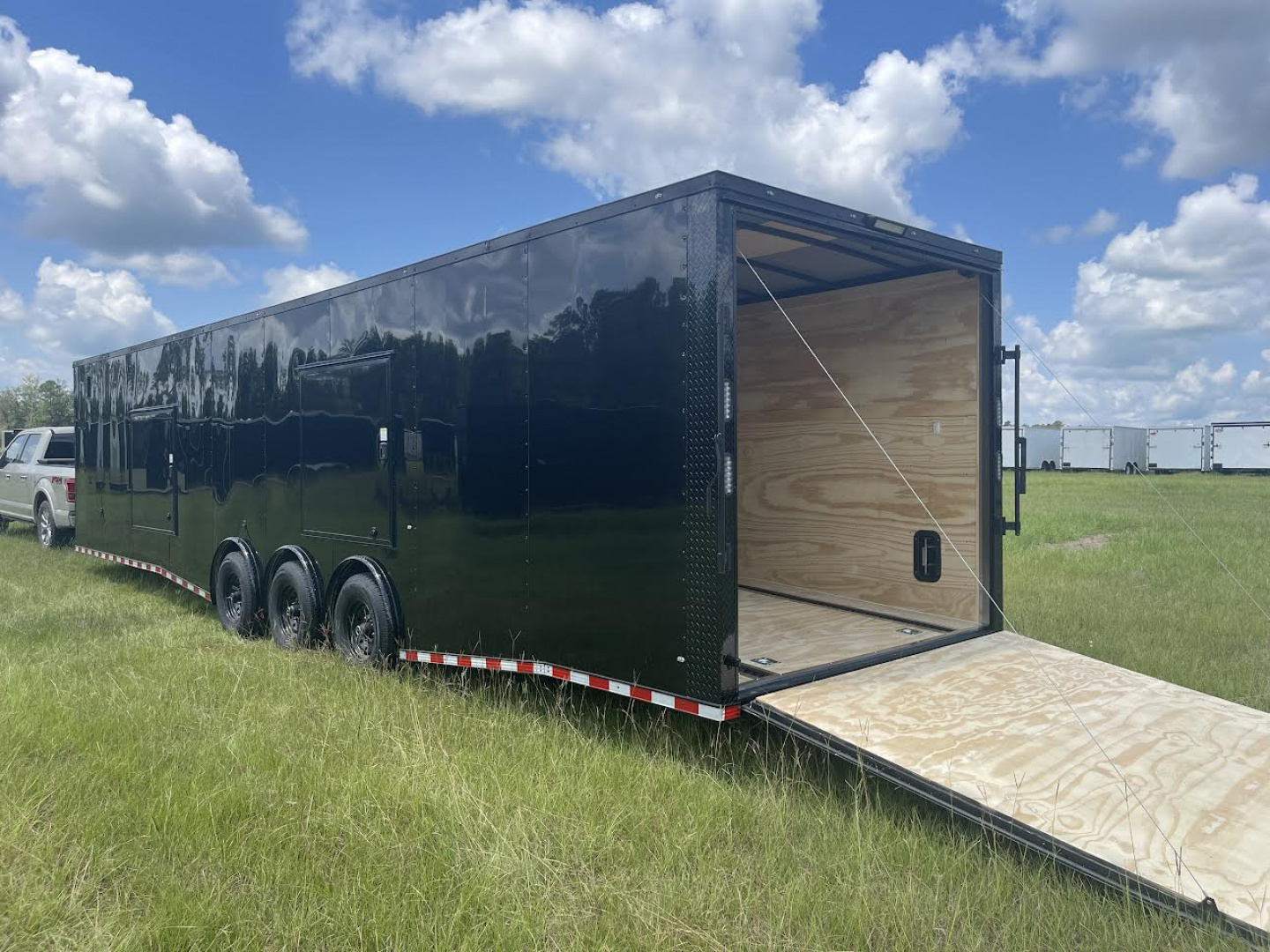 New 8.5x36 Polycore Blackout Enclosed Two Car Hauler - Rock Solid Cargo